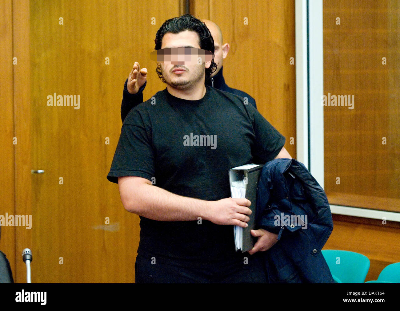 The accused 25-year-old German-Syrian Rami M. arrives at the court room ...