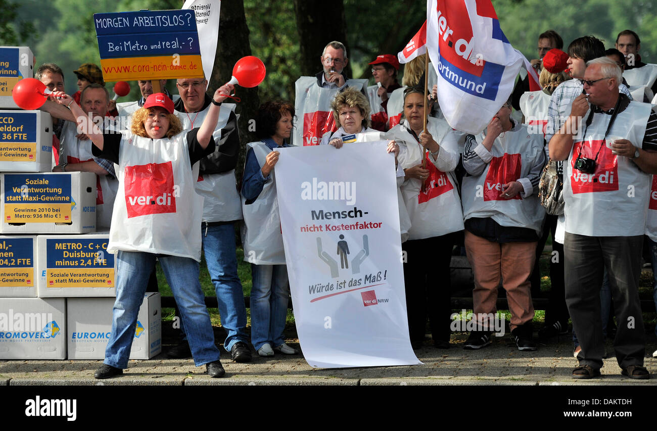 Members of German labour union Verdi protest outside the Metro Group ...