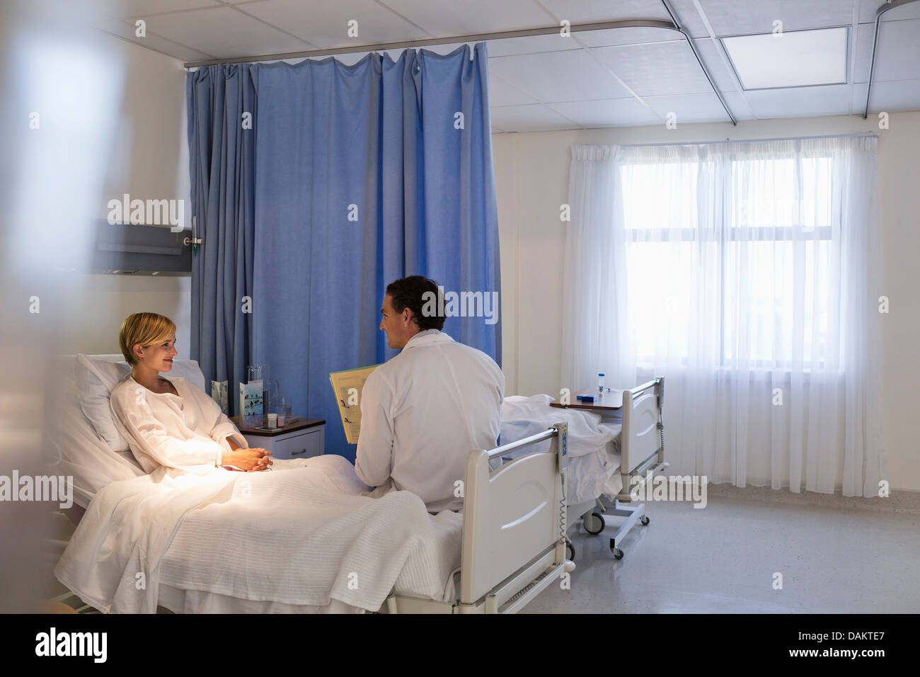 Female doctor in hospital room hi-res stock photography and images - Alamy