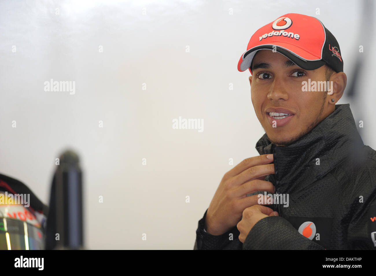 British Formula One driver Lewis Hamilton of McLaren Mercedes stands in ...