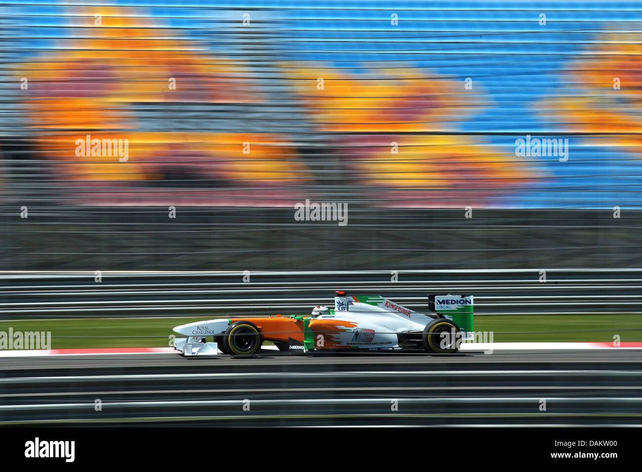 German Formula One driver Adrian Sutil of Force India steers his car ...