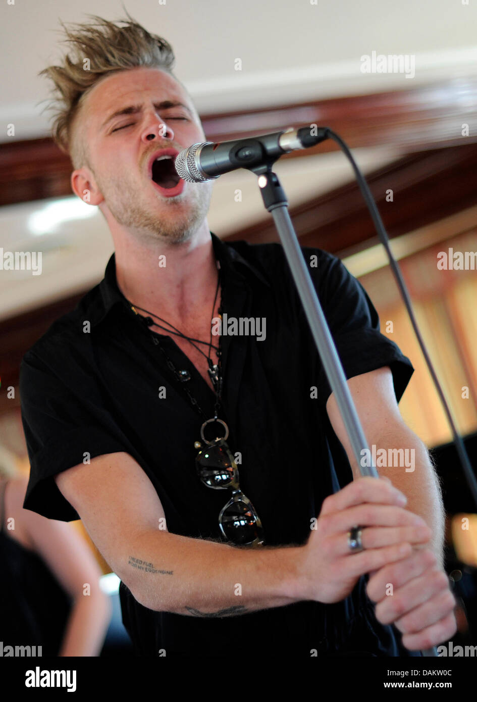 Singer Tim Schou of A Friend in London representing Denmark performs ...