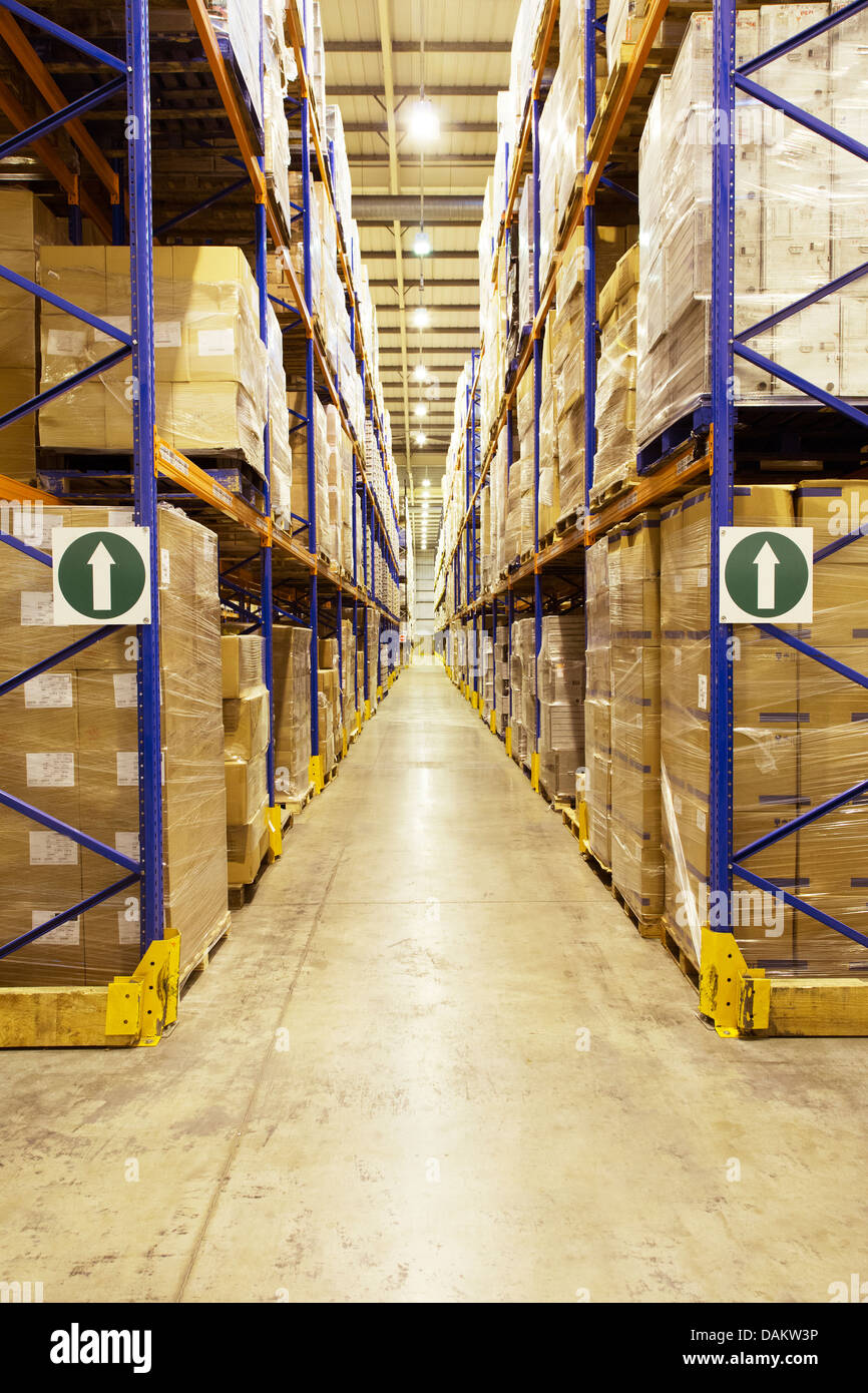 Pallets of boxes in warehouse Stock Photo - Alamy