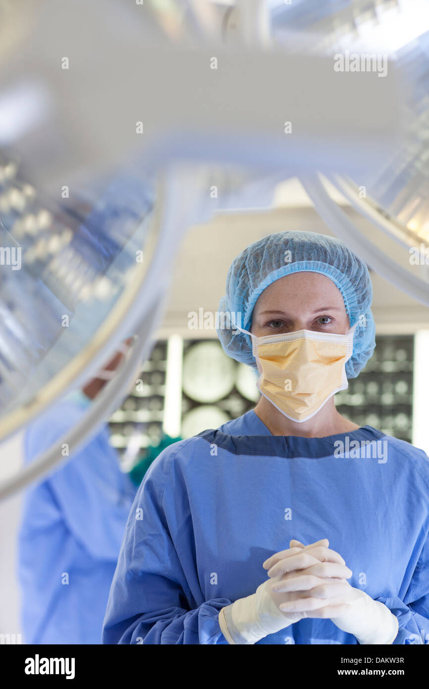 Surgeon standing in operating room Stock Photo - Alamy