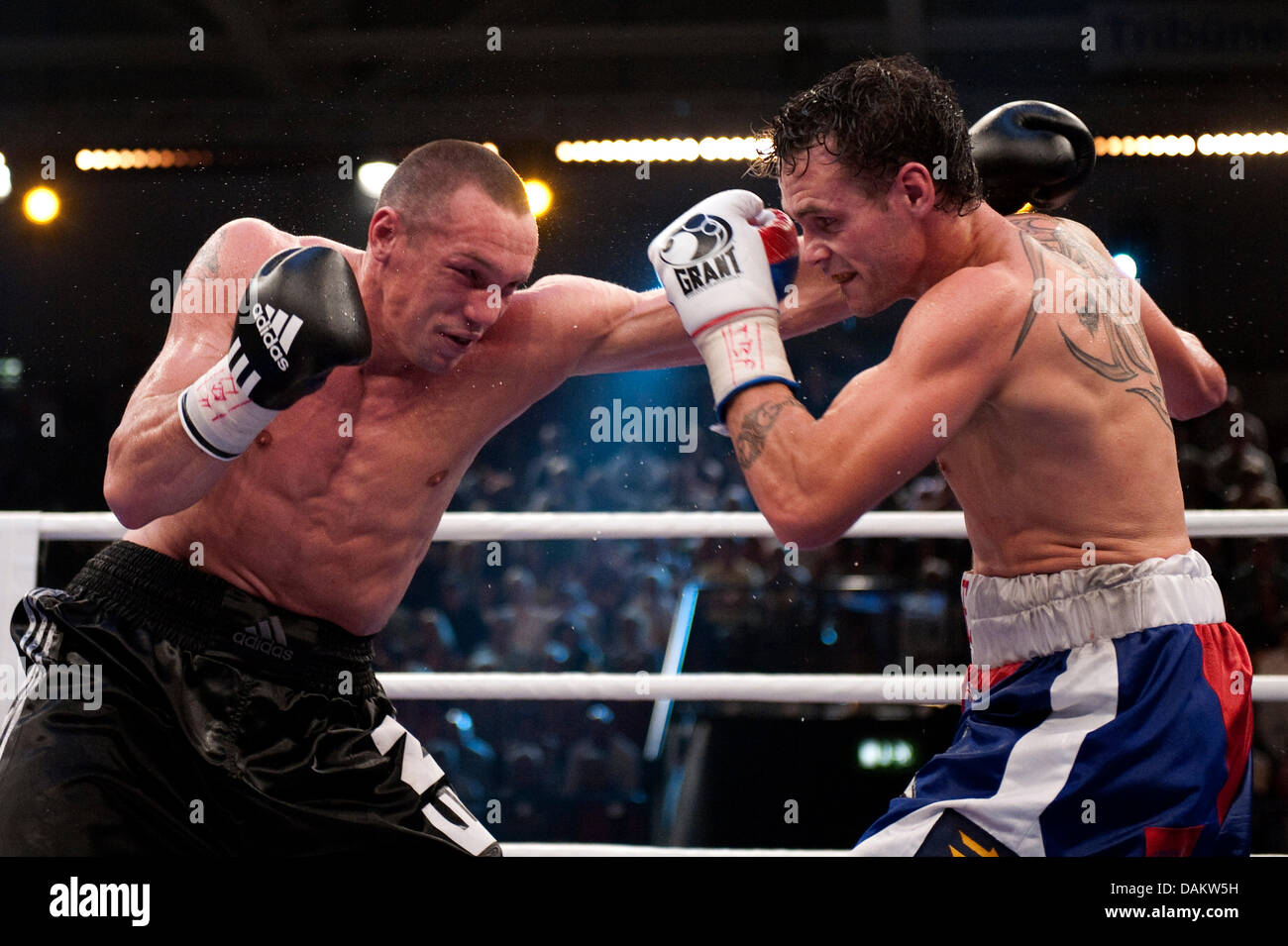The German boxer Sebastian Sylvester (L) and Australian boxer Daniel ...