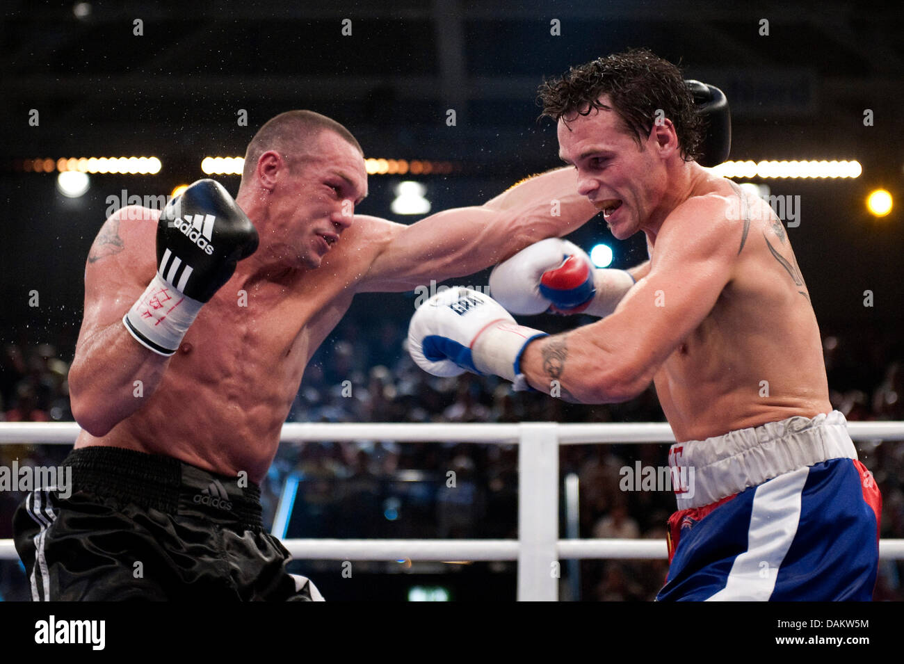 The German boxer Sebastian Sylvester (L) and Australian boxer Daniel ...