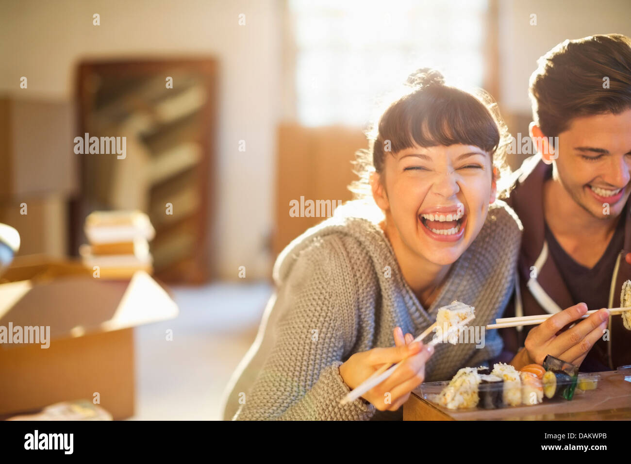 Couple eating sushi together Stock Photo - Alamy