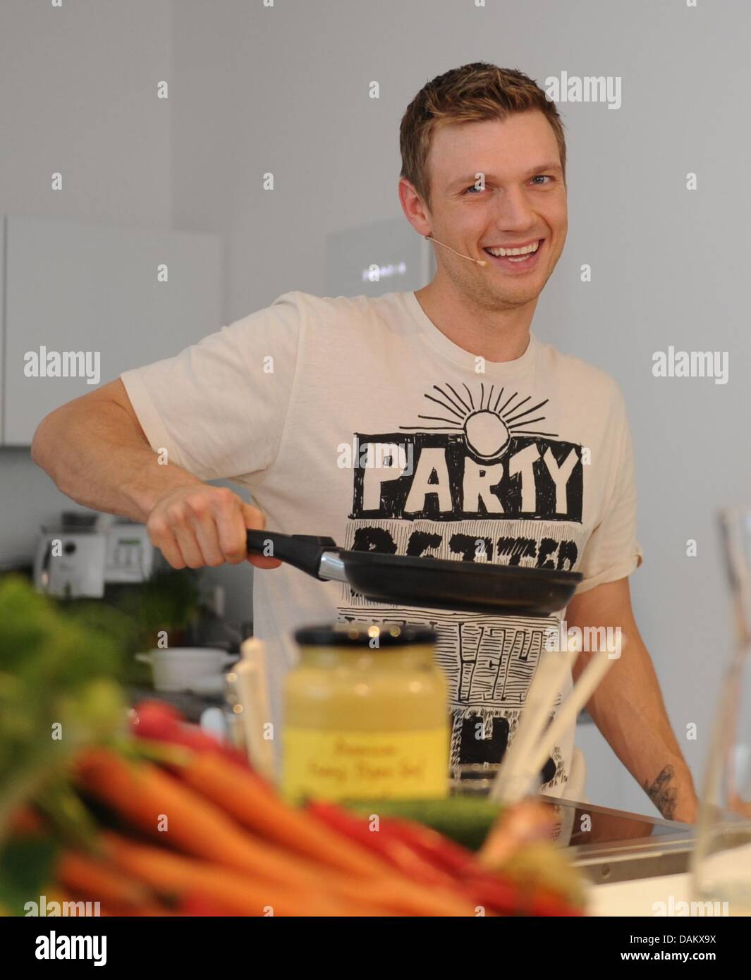 Singer Nick Carter cooks at a press event in Munich, Germany, 10 May ...