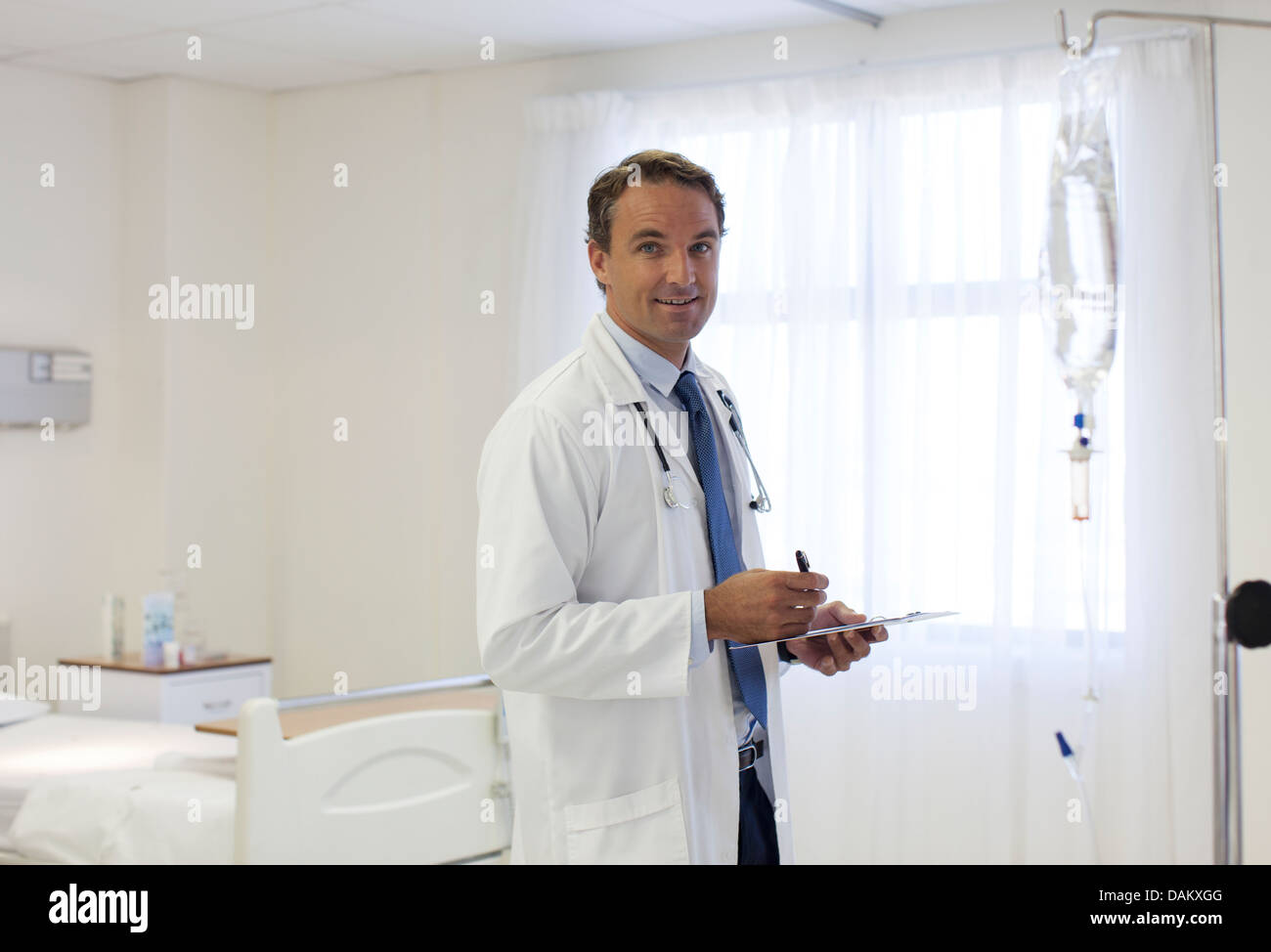 Doctor writing on board in hi-res stock photography and images - Alamy