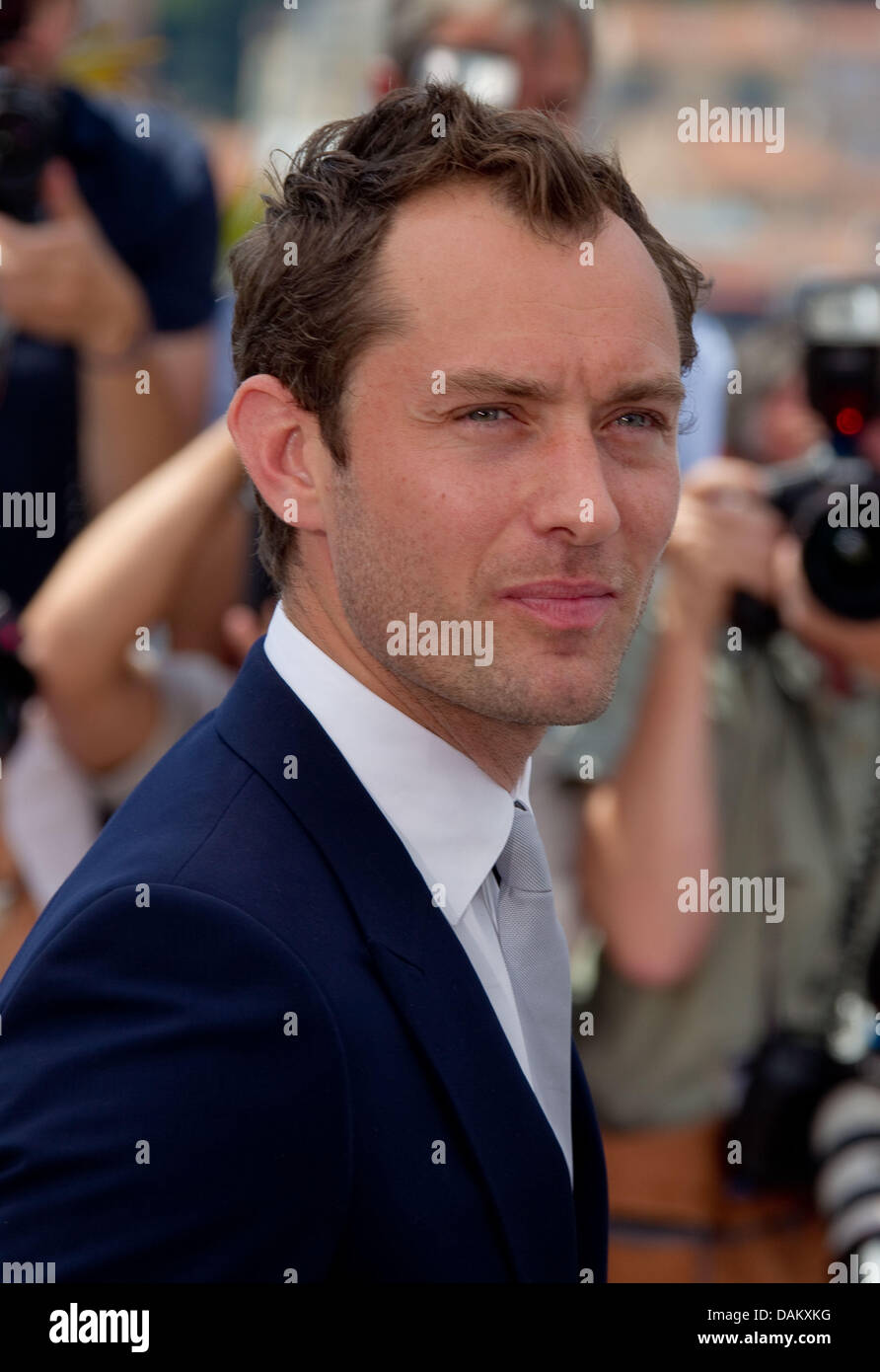 Actor Jude Law poses during the jury photocall at the Cannes Film ...