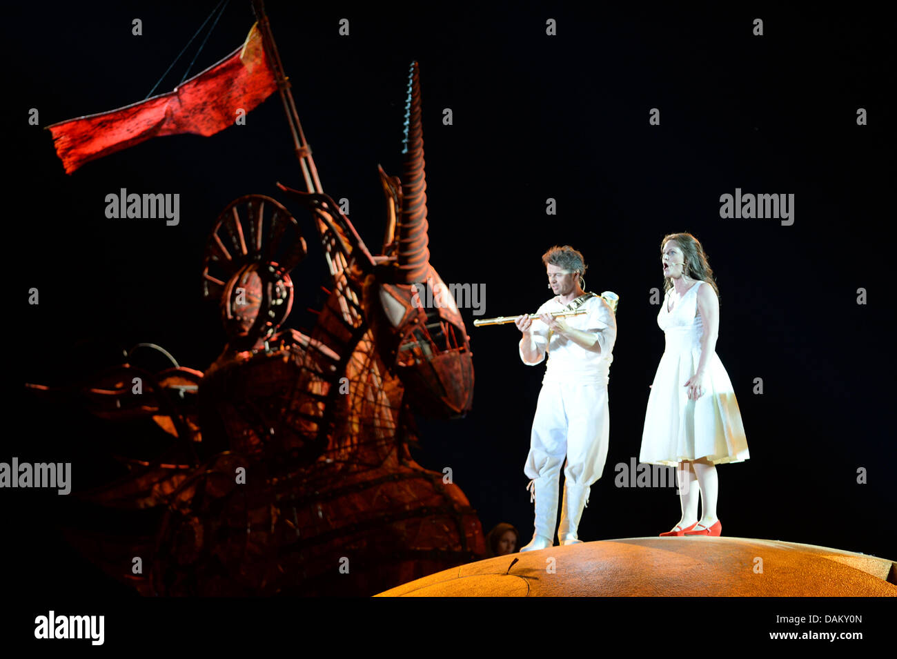 Tenor singer Rainer Trost in the role of Tamino (L) and soprano Gisela ...