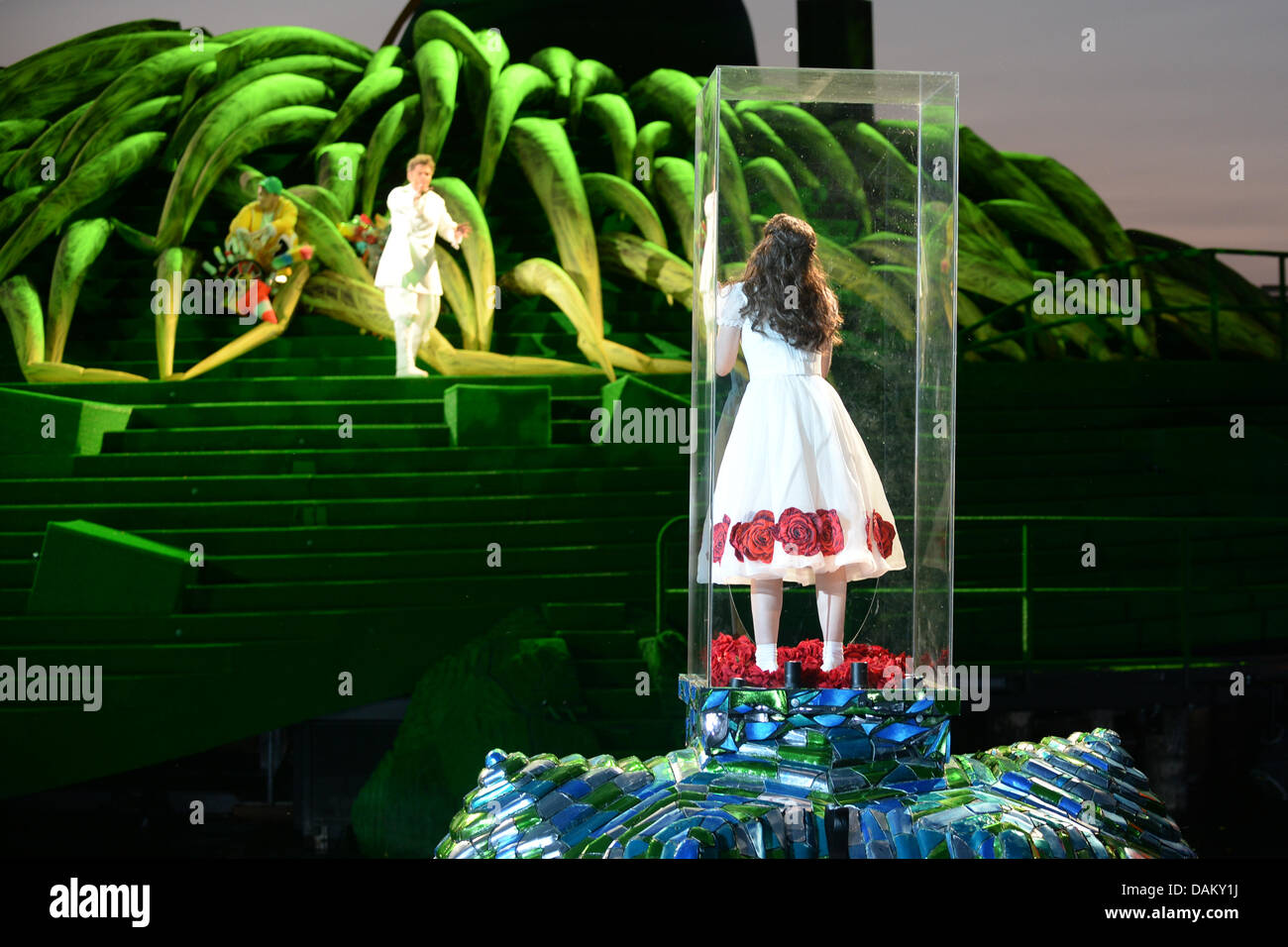 Tenor singer Rainer Trost (L, top) in the role of Tamino and soprano ...