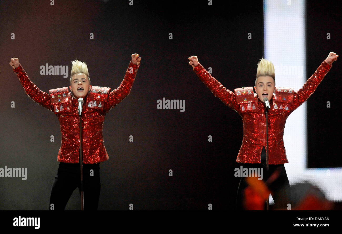 Twins John and Edward Grimes of Jedward representing Ireland perform ...