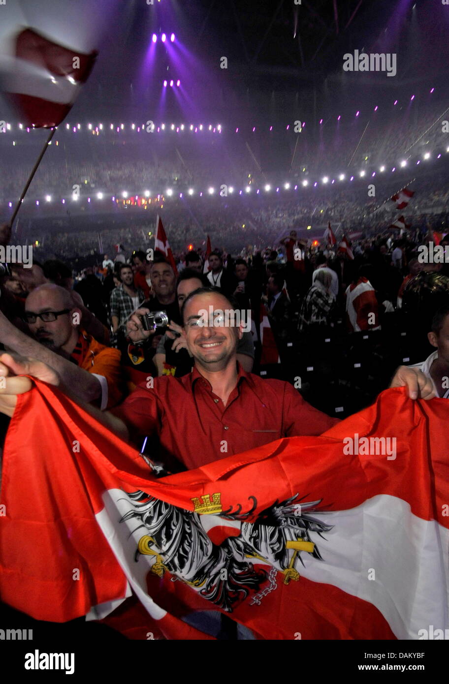 An Austrian fan celebrates after the second Semi-Final of the ...