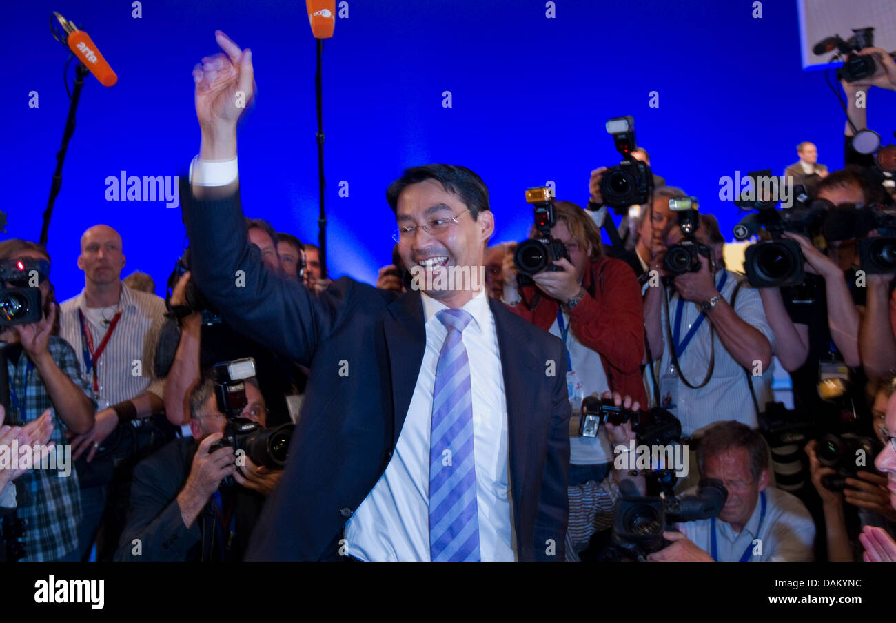 Newly elected FDP chairman Philipp Roesler takes in the applause at the ...