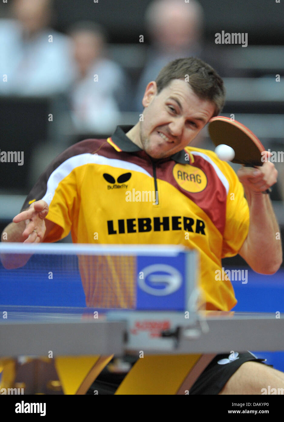 Timo Boll of Germany in action against Ovtcharov of Germany during the ...