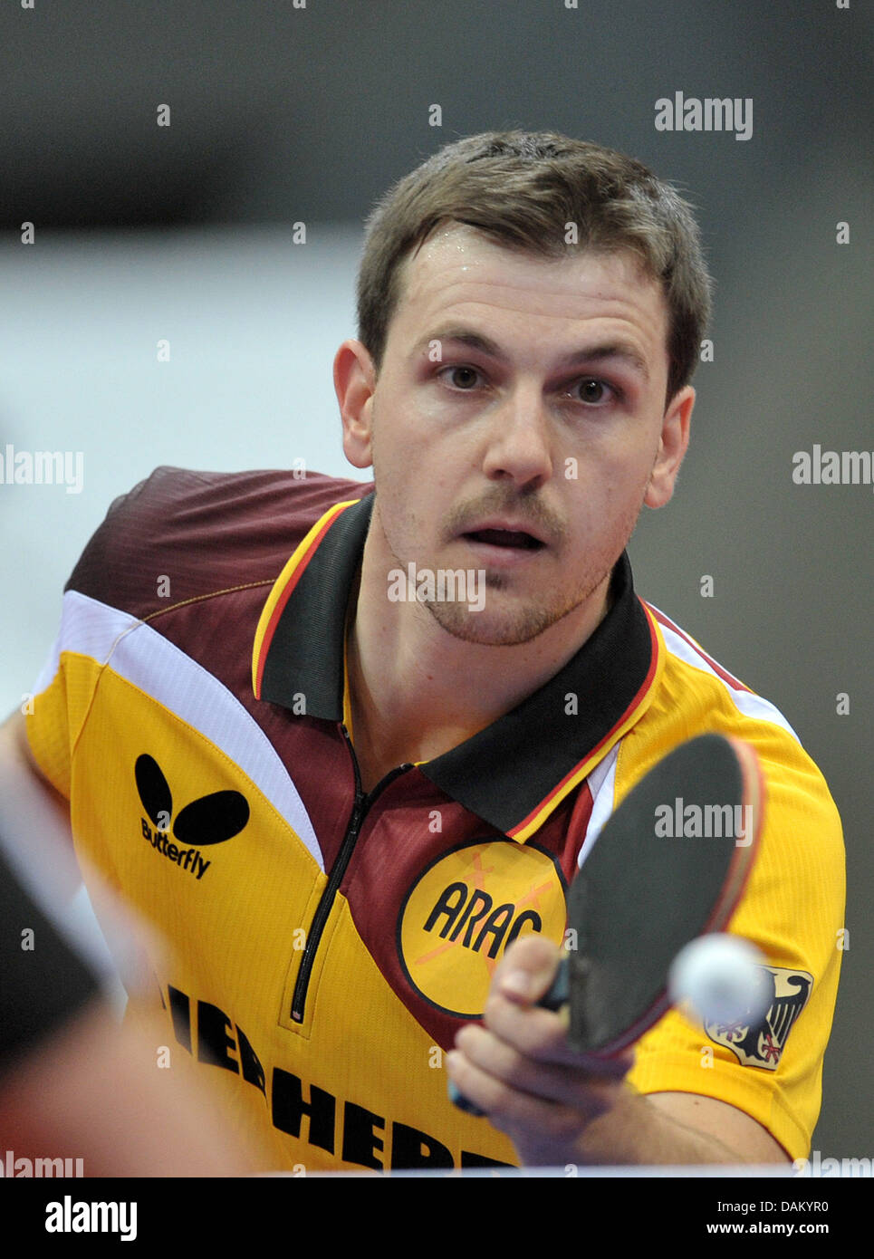 Timo Boll of Germany in action against Ovtcharov of Germany during the ...