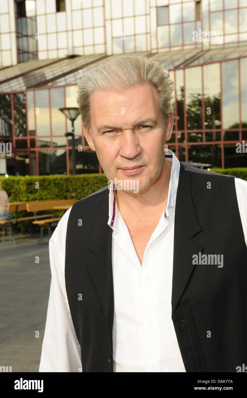 Irish singer and composer Johnny Logan poses during his visit to ...
