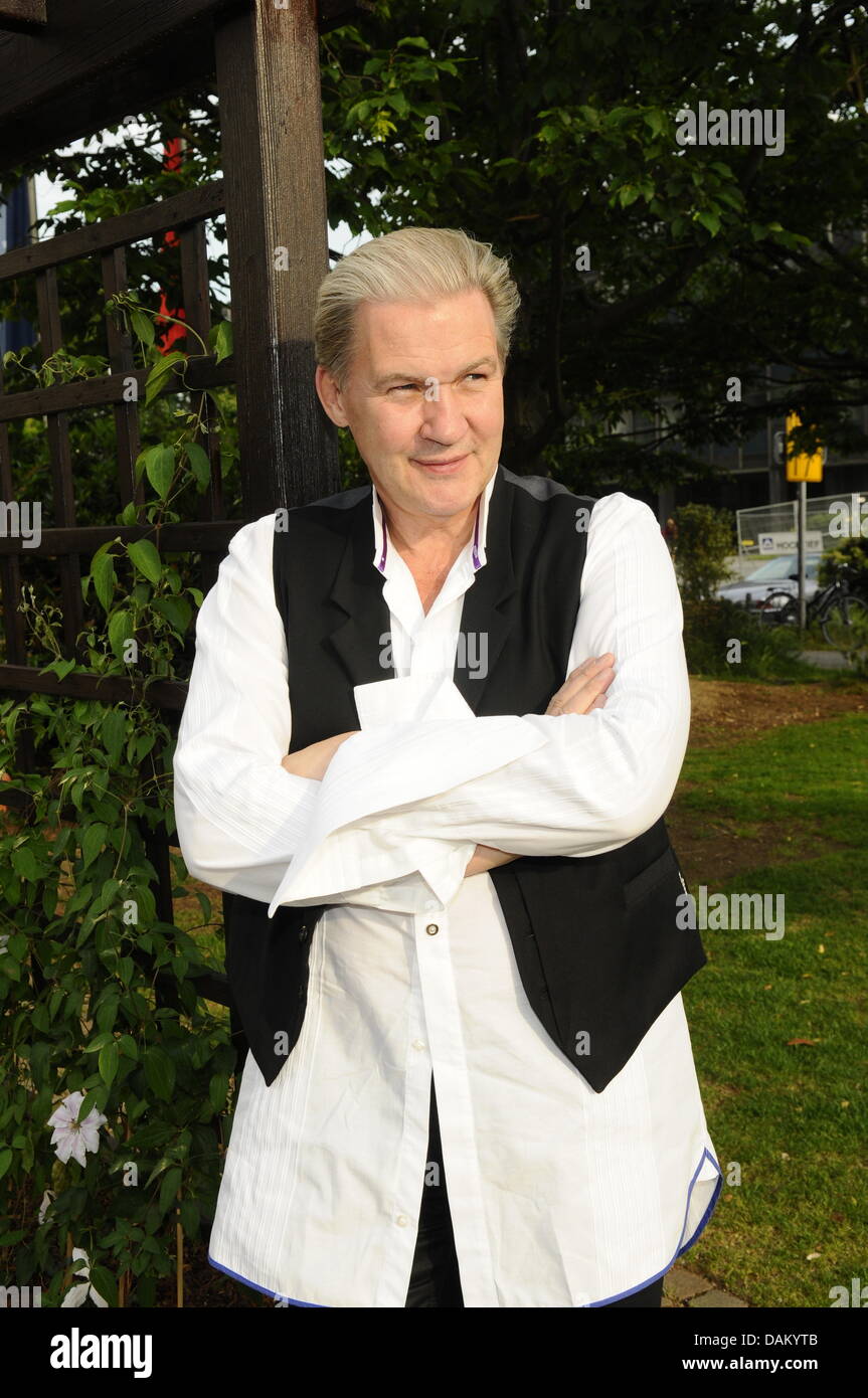 Irish singer and composer Johnny Logan poses during his visit to ...