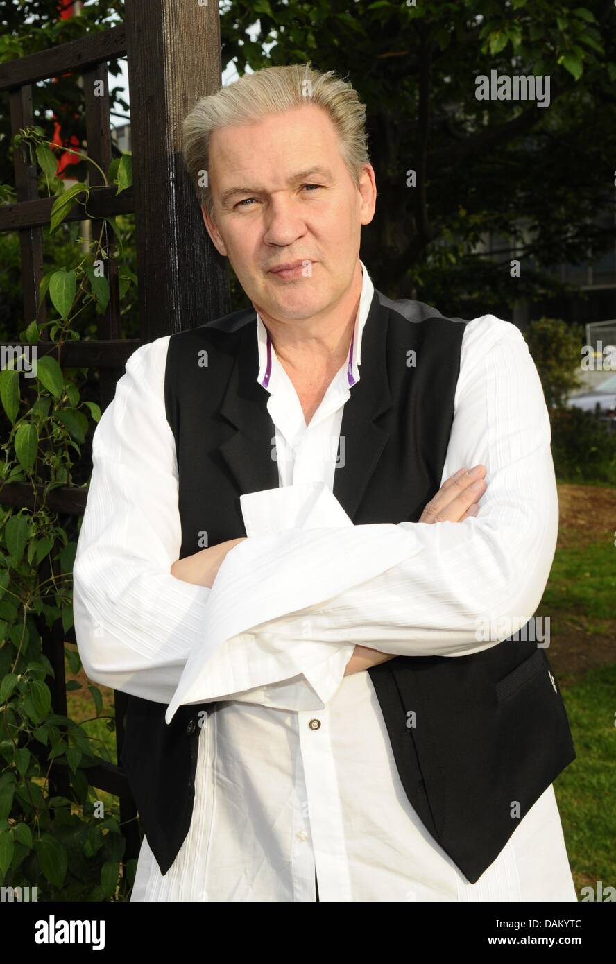 Irish singer and composer Johnny Logan poses during his visit to ...