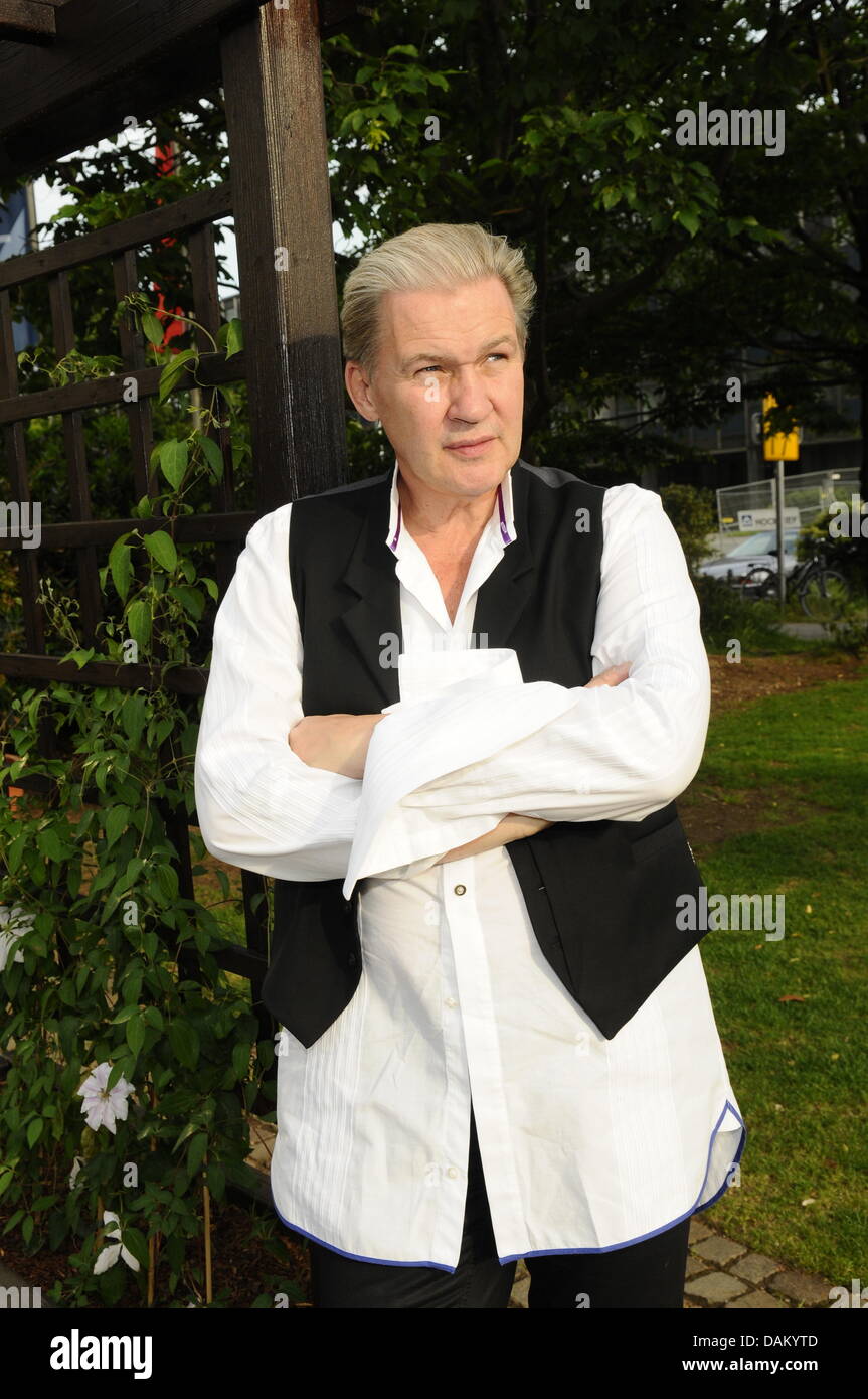 Irish singer and composer Johnny Logan poses during his visit to ...