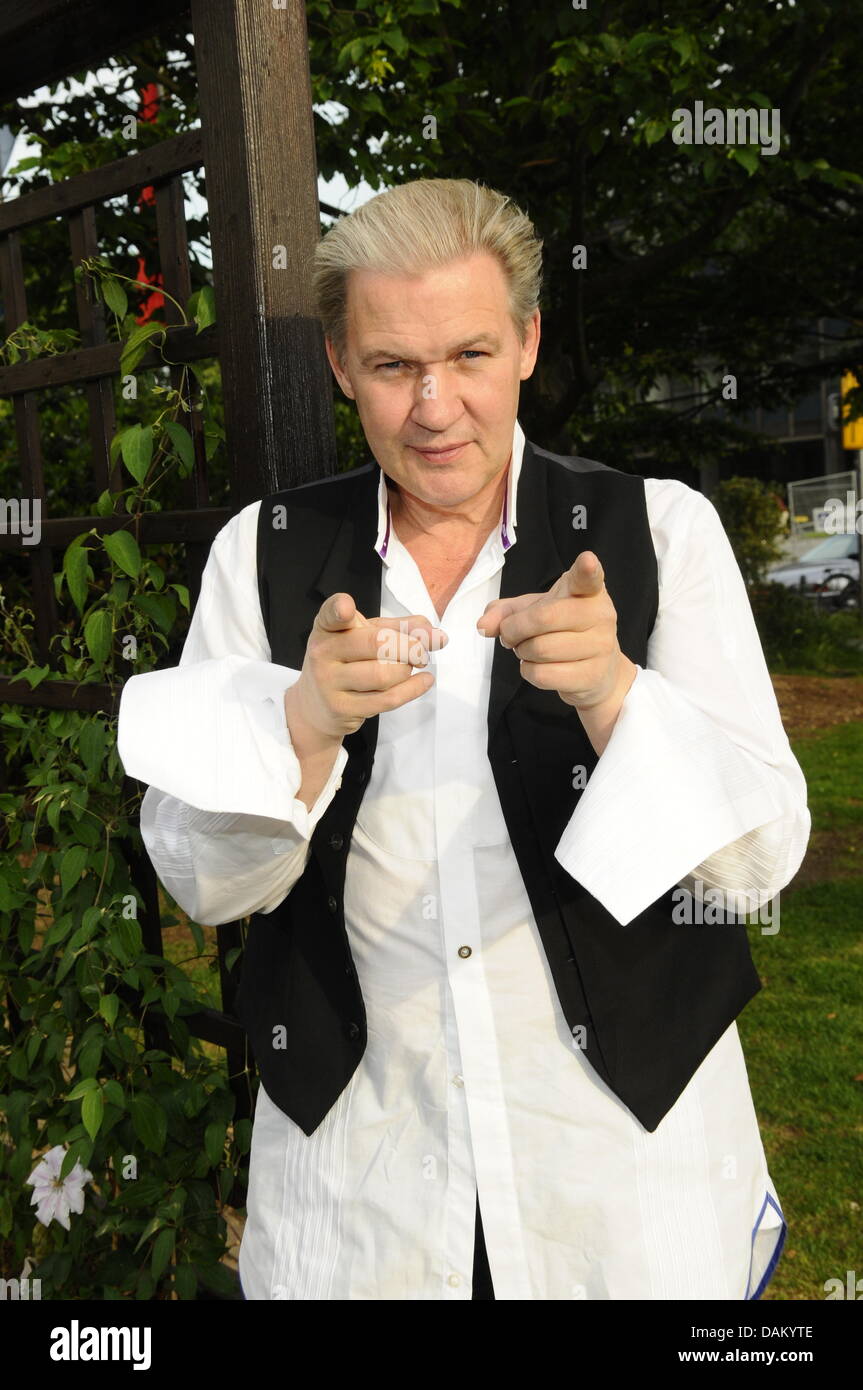 Irish singer and composer Johnny Logan poses during his visit to ...