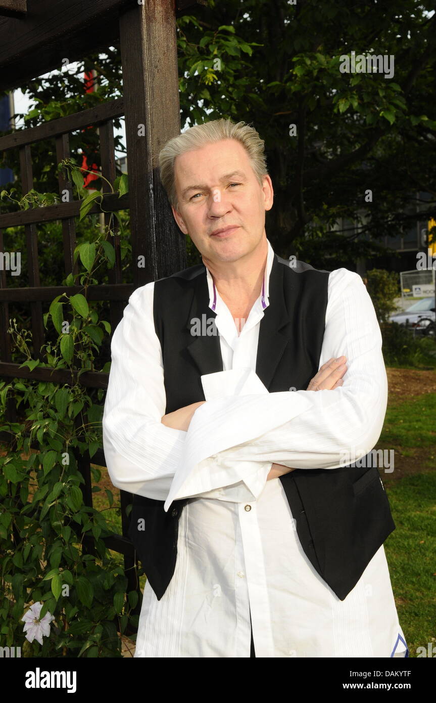 Irish singer and composer Johnny Logan poses during his visit to ...
