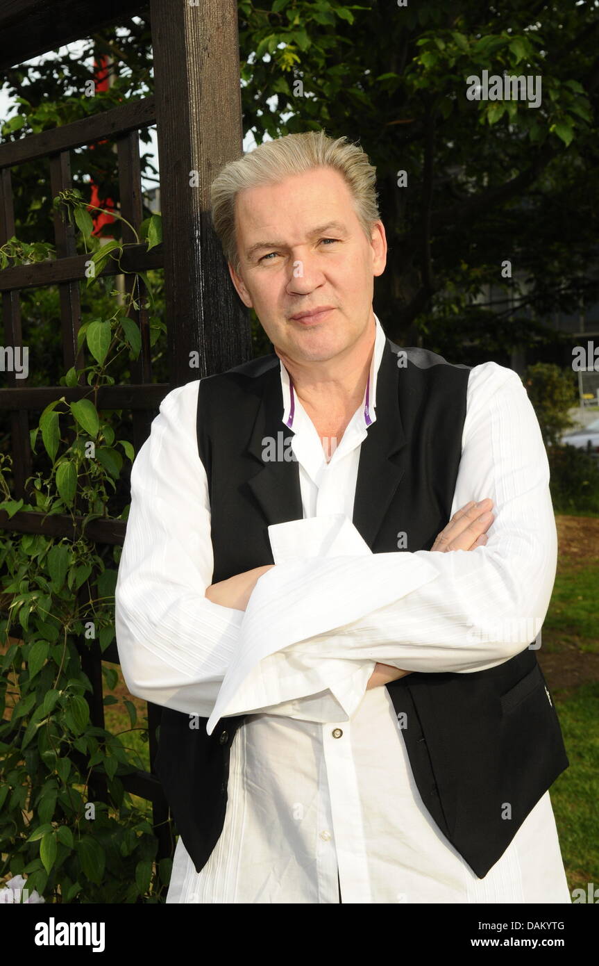 Irish singer and composer Johnny Logan poses during his visit to ...