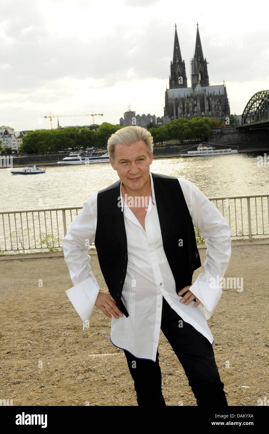 Irish singer and composer Johnny Logan poses during his visit to ...