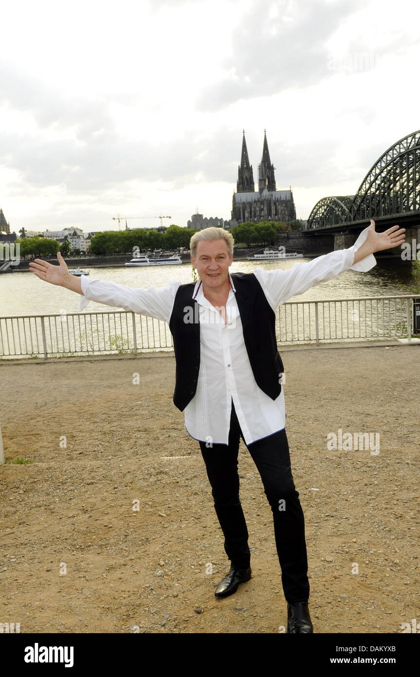 Irish singer and composer Johnny Logan poses during his visit to ...