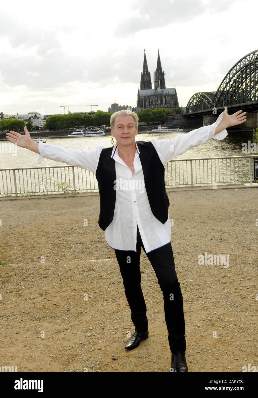 Irish singer and composer Johnny Logan poses during his visit to ...