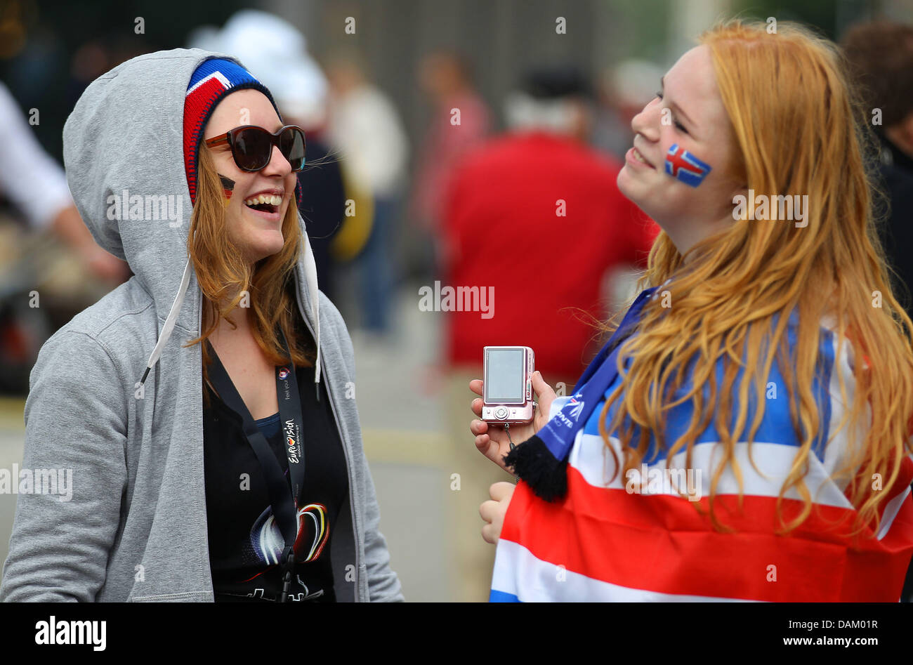 Fans of the Eurovision Song Contest attend a parade of rifle- and ...