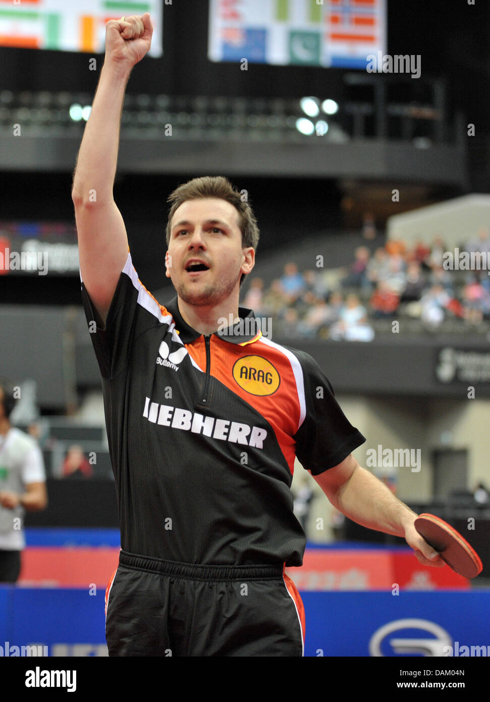 Timo Boll of Germany celebrates after winning against Chen Qi of China ...