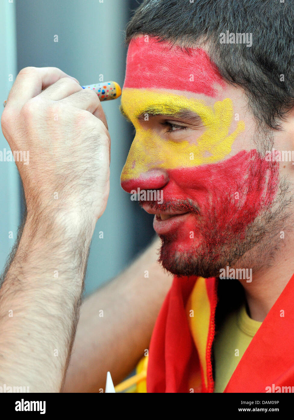 A fan supporting Spain arrives for the Grand Final of the Eurovision ...