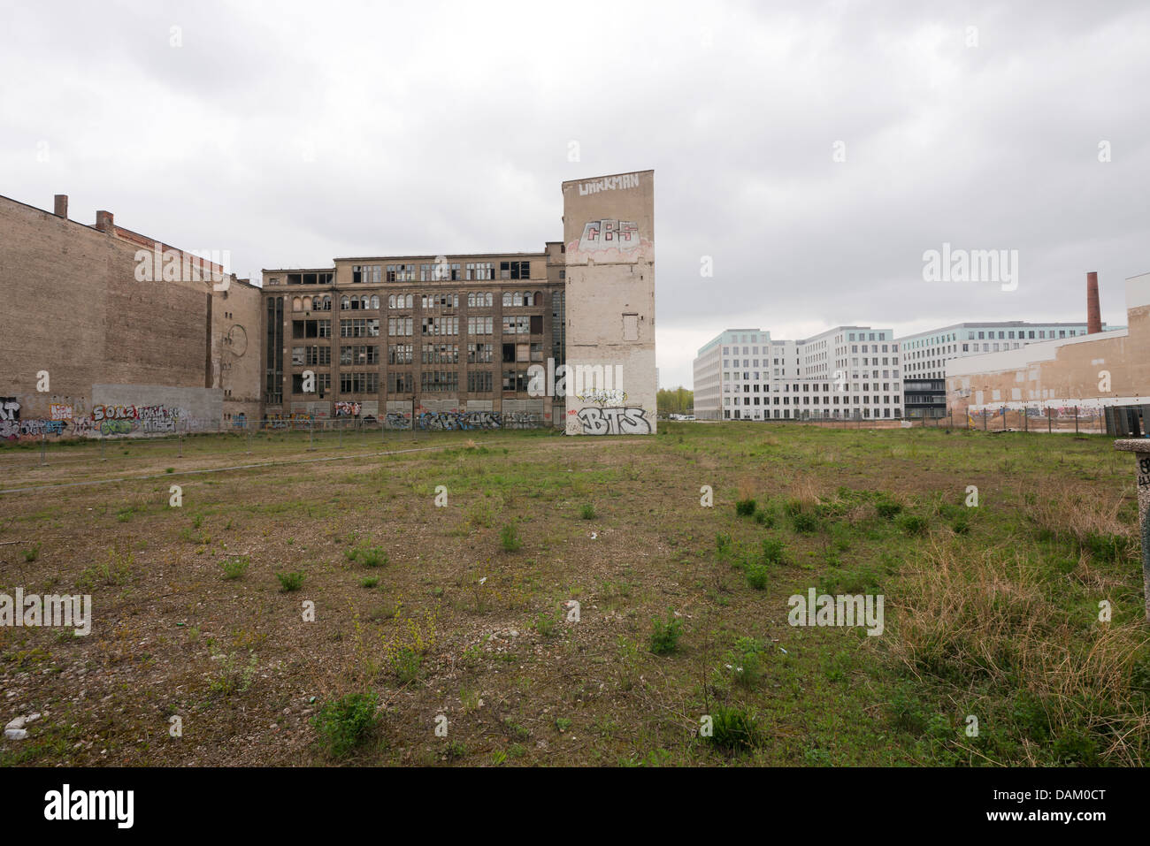 Broken factory beside new building hi-res stock photography and images ...
