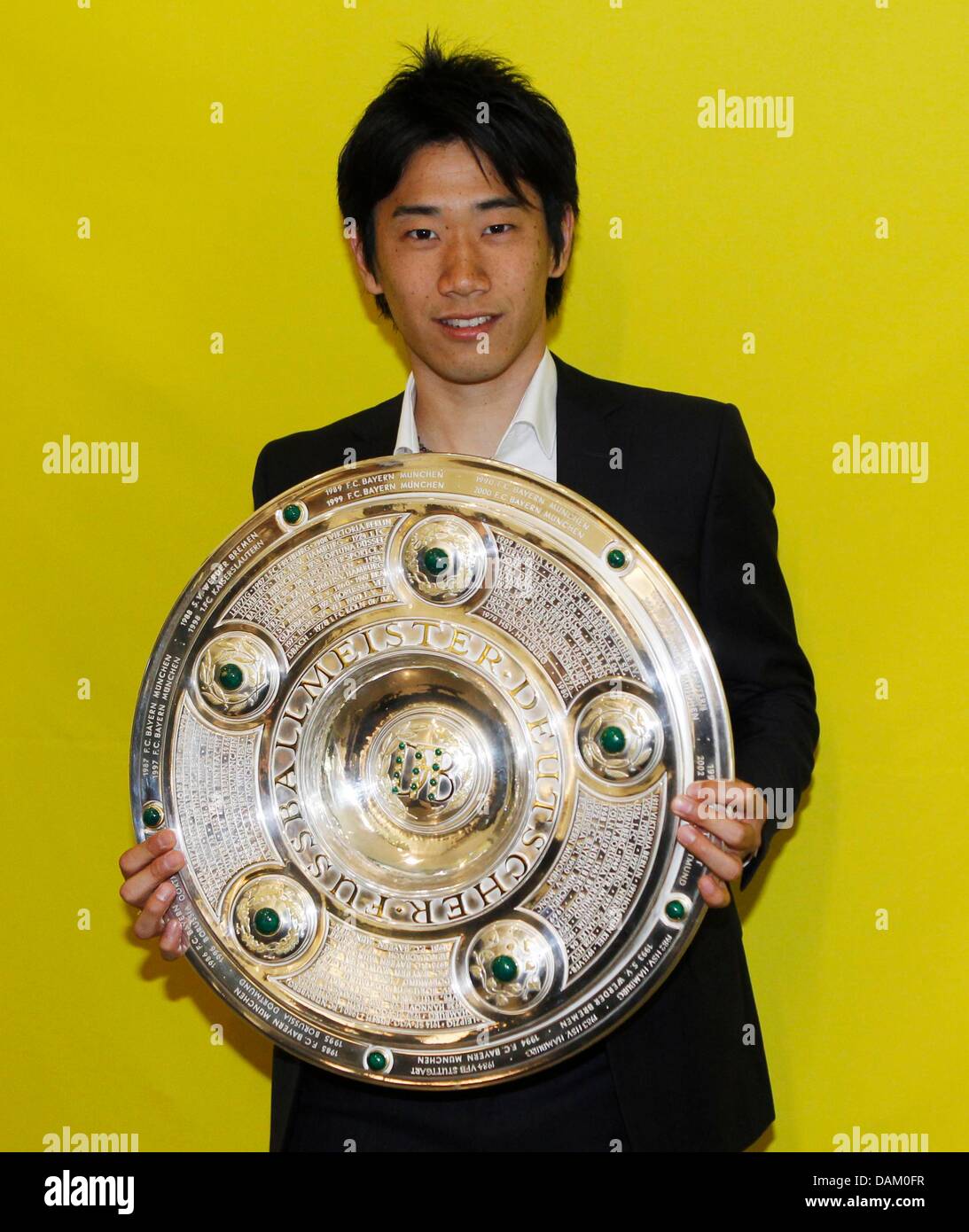 Borussia Dortmund's Shinji Kagawa poses with the German Championship ...