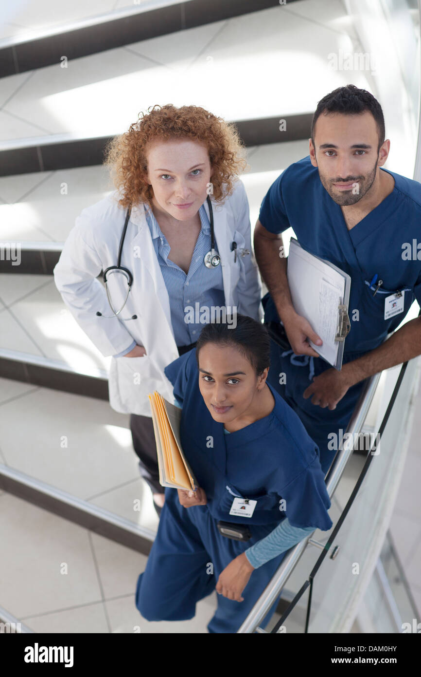 Doctor and nurses on hospital steps Stock Photo - Alamy