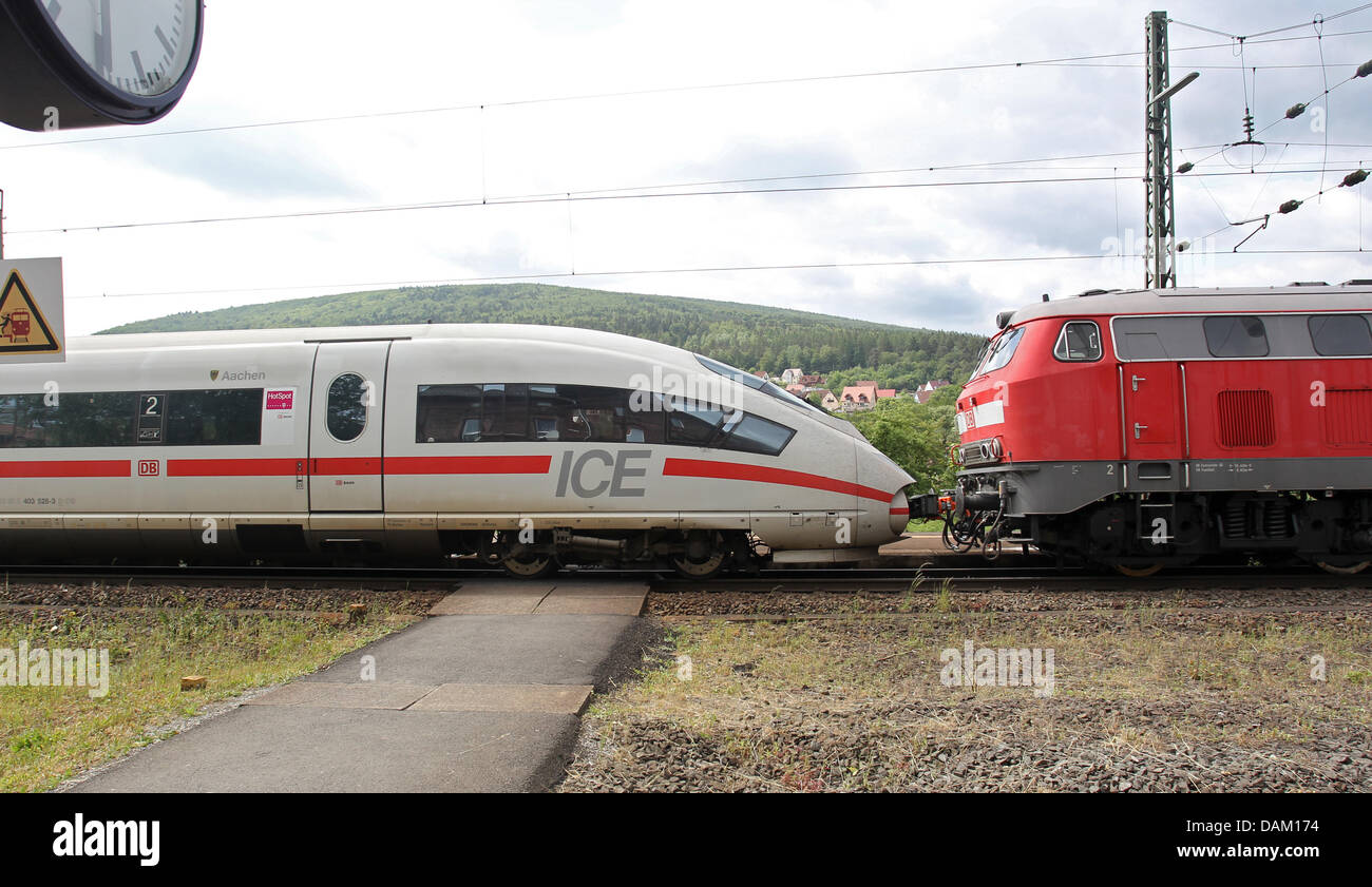 A defect ICE is dragged out of the station in Partenstein, Germany, 16 ...