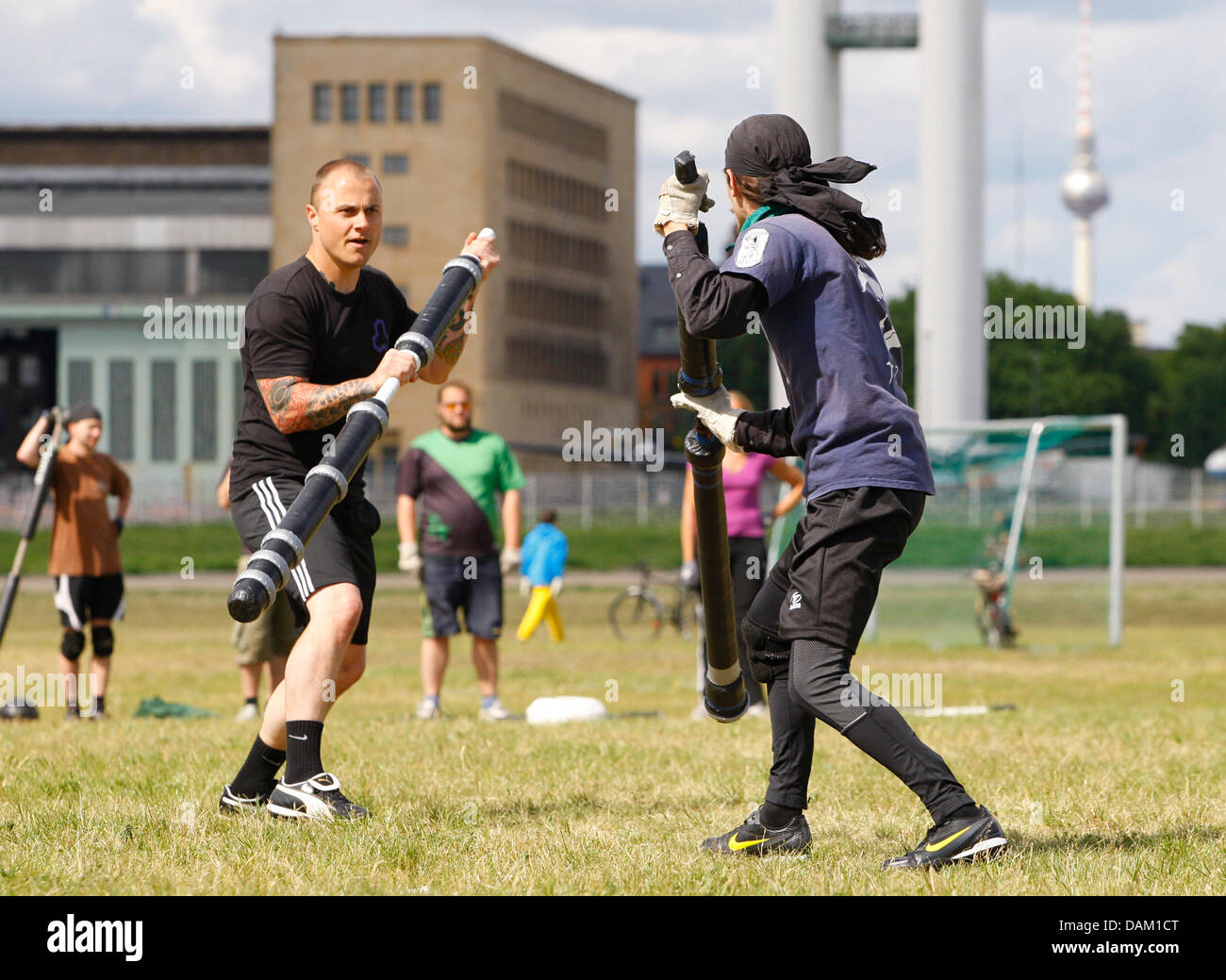 People play 'Jugger' at Tempelhof Park in Berlin, Germany, 15 May 2011 ...