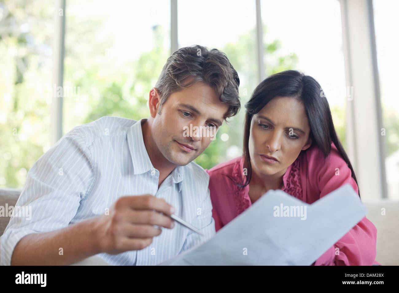 Two men reading paper hi-res stock photography and images - Alamy