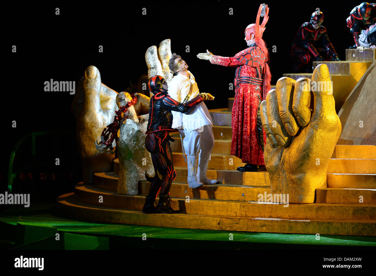 Tenor singer Rainer Trost in the role of Tamino (2nd L) and bass singer ...