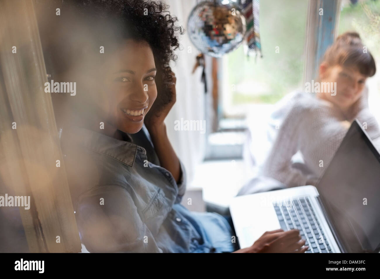 Woman laptop window hi-res stock photography and images - Alamy