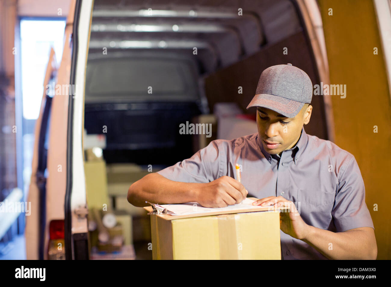 Delivery boy hi-res stock photography and images - Alamy