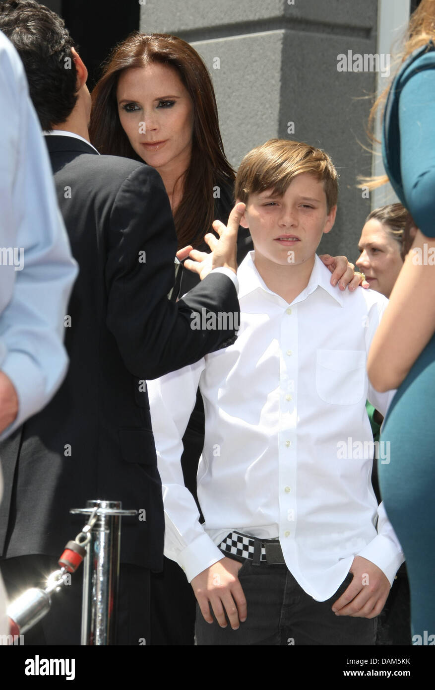 Singer Victoria Beckham and her son Brookyln attends the ceremony ...