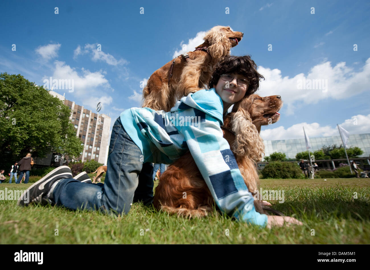 Dog lover Fabian poses with cocker spaniel Grasland Ghost (BELOW) and ...