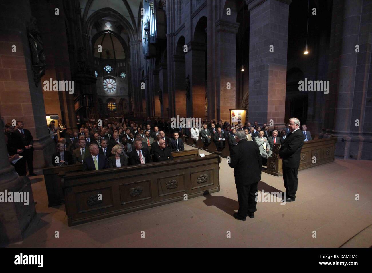 German president Christian Wulff is welcomed by cardinal Karl Lehmann ...