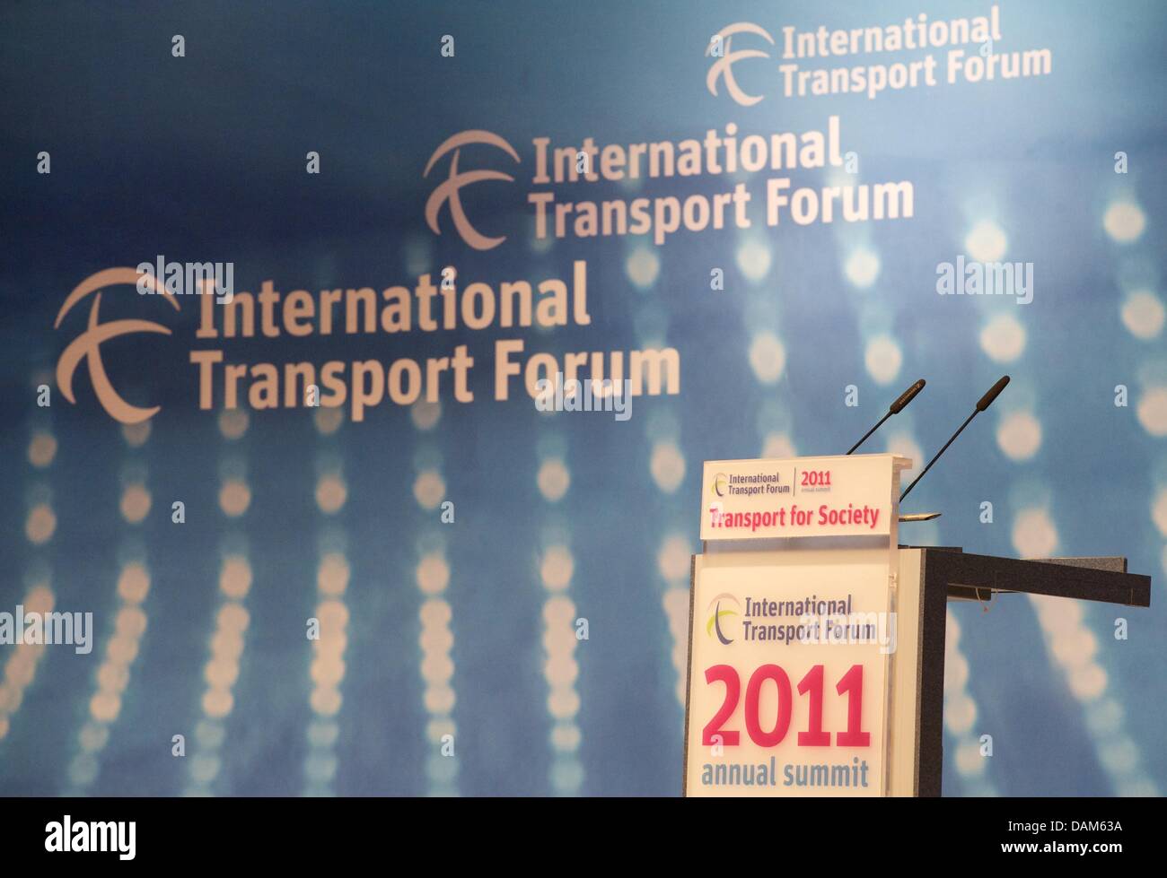 The logo of the International Transport Forum (ITF) 2011 and a speaker ...