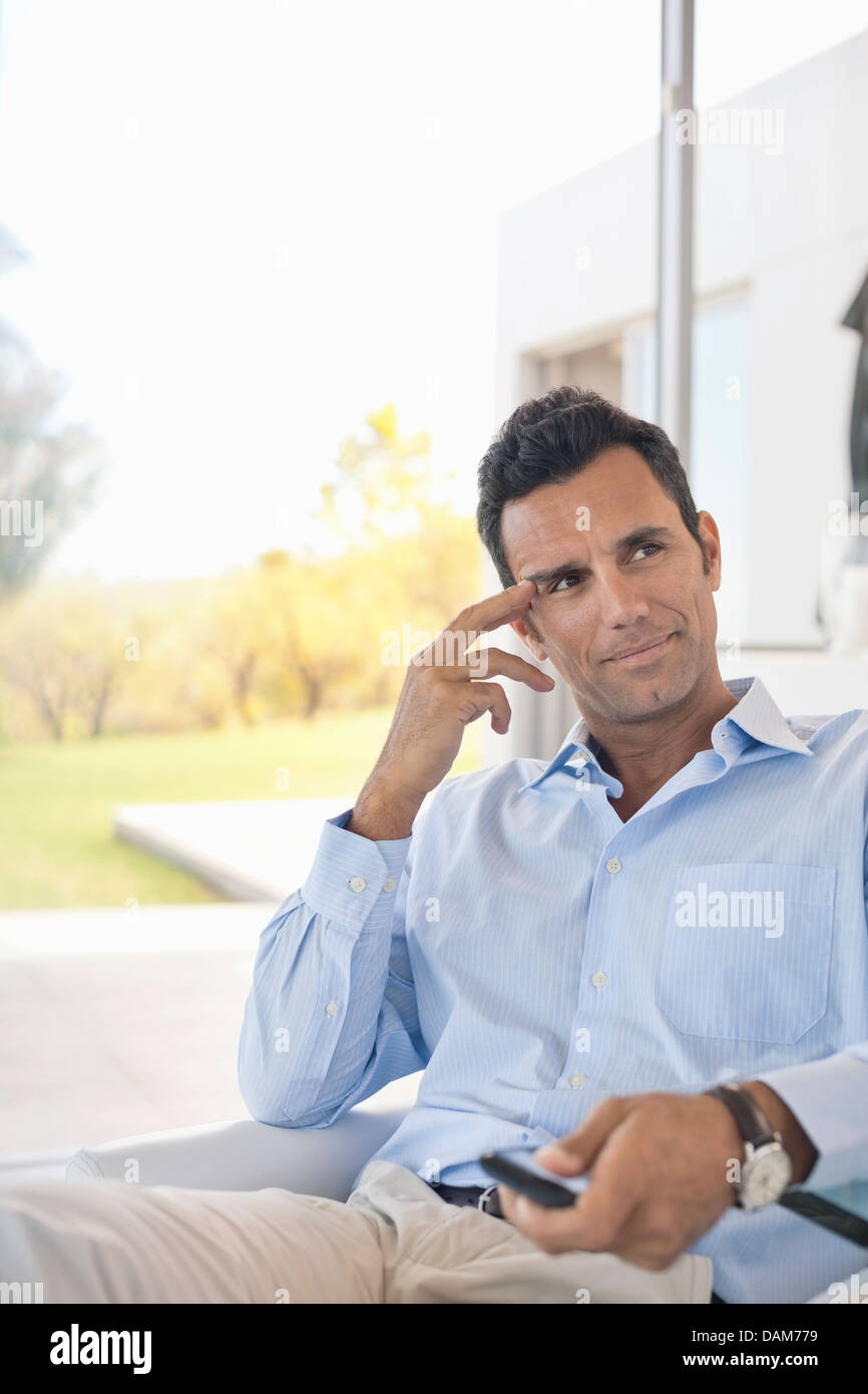 Texting watching tv text messaging hi-res stock photography and images ...