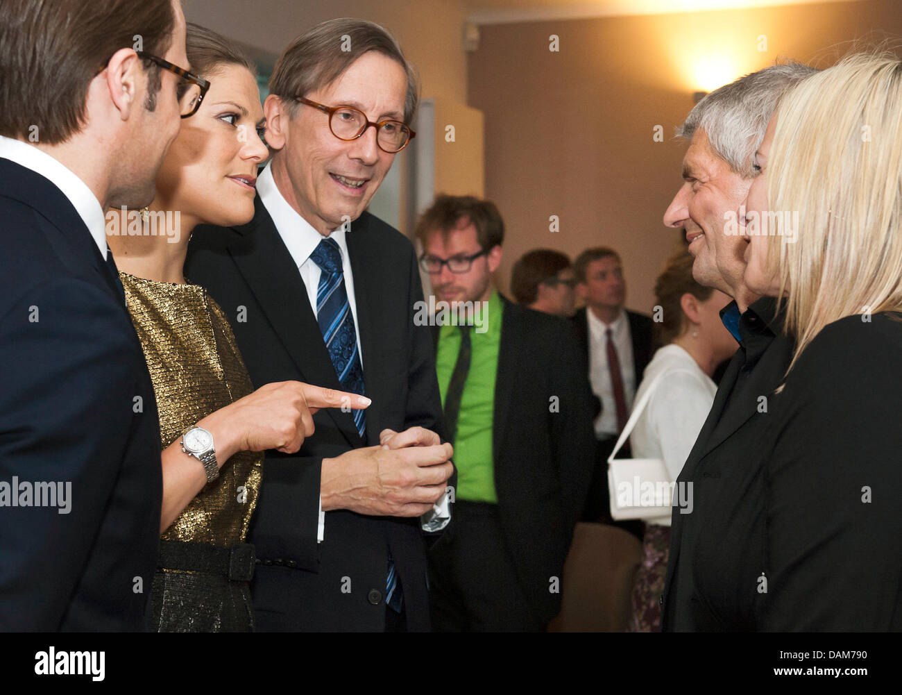 Swedish Princess Victoria (2-l) and her husband Daniel (l) stand next ...
