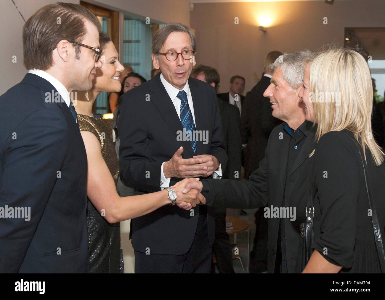 Swedish Princess Victoria (2-l) and her husband Daniel (l) stand next ...